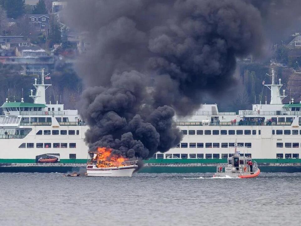 Seattle fire, Coast Guard tow burned boat to shallow water after rescue ...