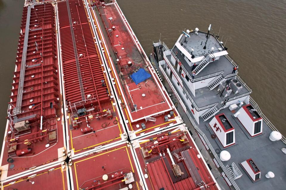 Helicopter crashes into barge on Mississippi River, killing two - NewsBreak