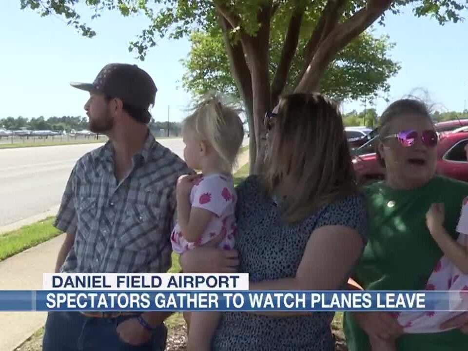 Locals watch planes at Daniel Field
