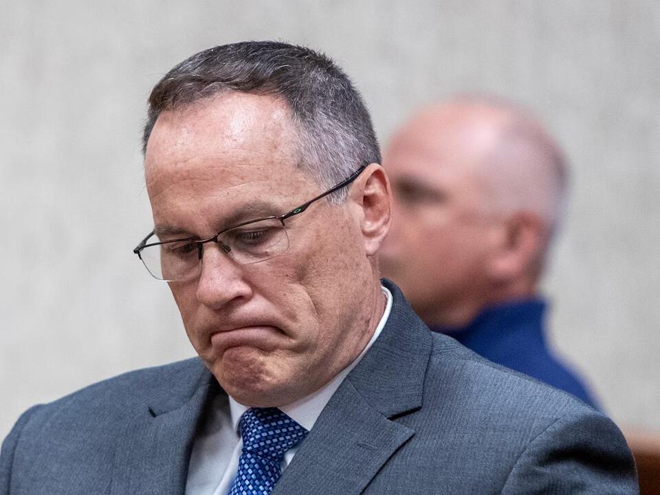 Ex-trooper says car skidded in puddle before fatally striking a fleeing ...