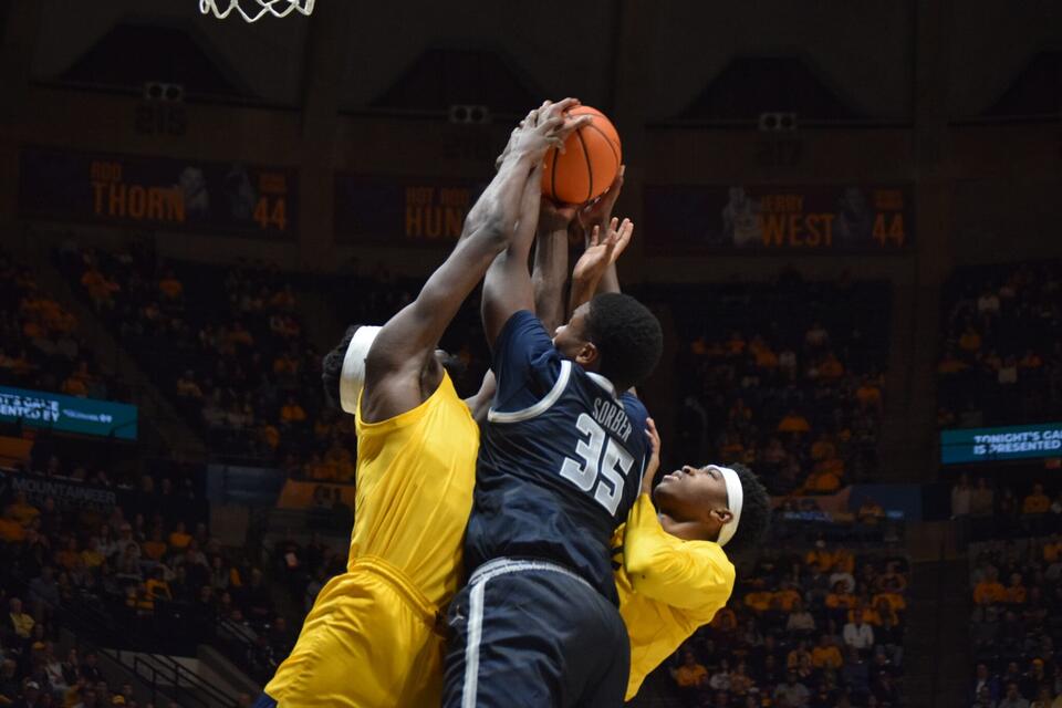 WVU Basketball Uses 2nd Half Run to Excite Home Crowd, Top Georgetown ...