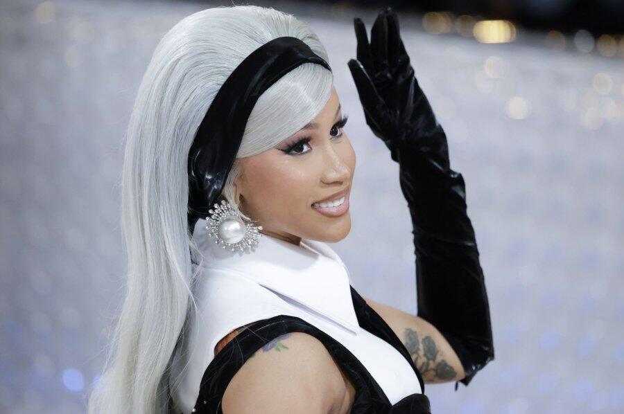 Cardi B throws microphone at concertgoer who tossed cup filled with ...