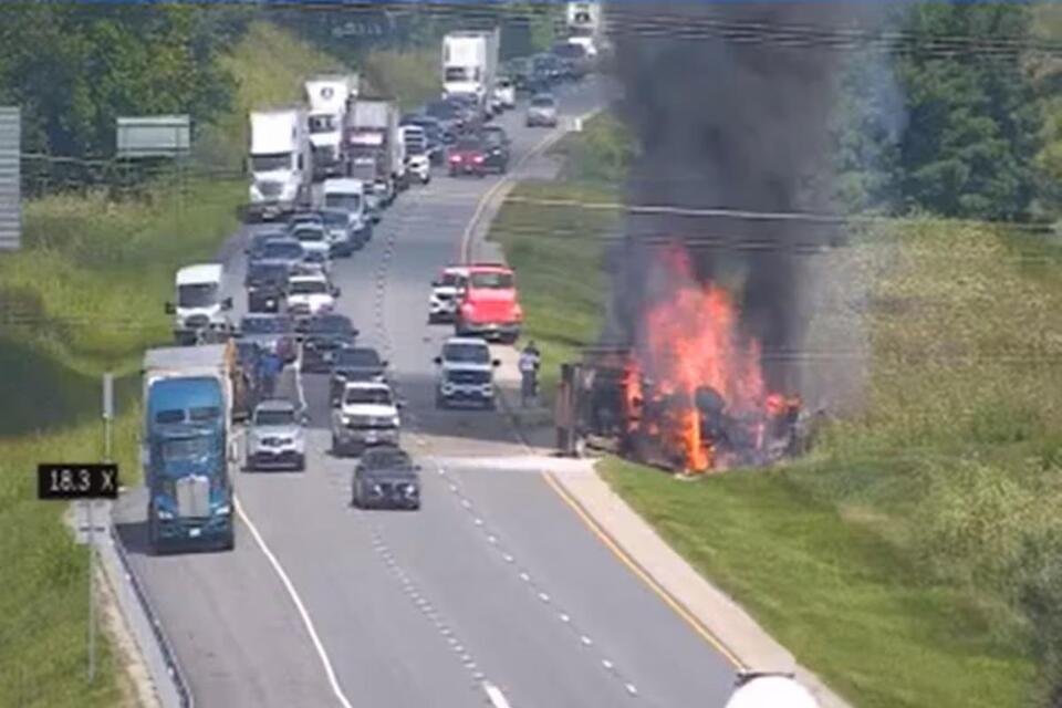 Driver burned after dump truck catches fire, causing backups on I-64 ...
