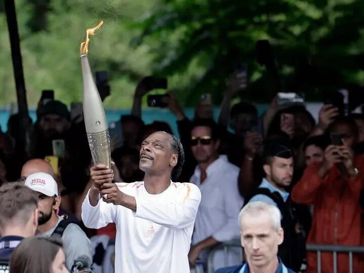 Paris Olympics opening ceremony redeems itself with flame as stunning ...