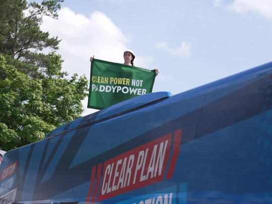 Climate protester climbs Conservative ‘battle bus’ ahead of James ...