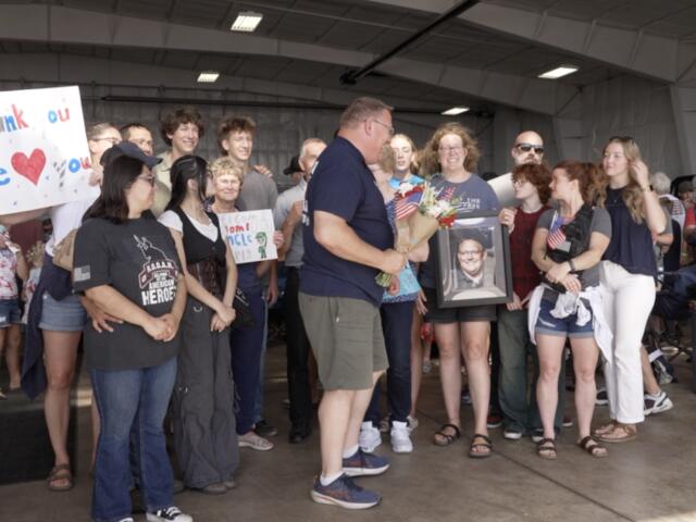 Veterans receive hero's welcome home after emotional New York retreat ...