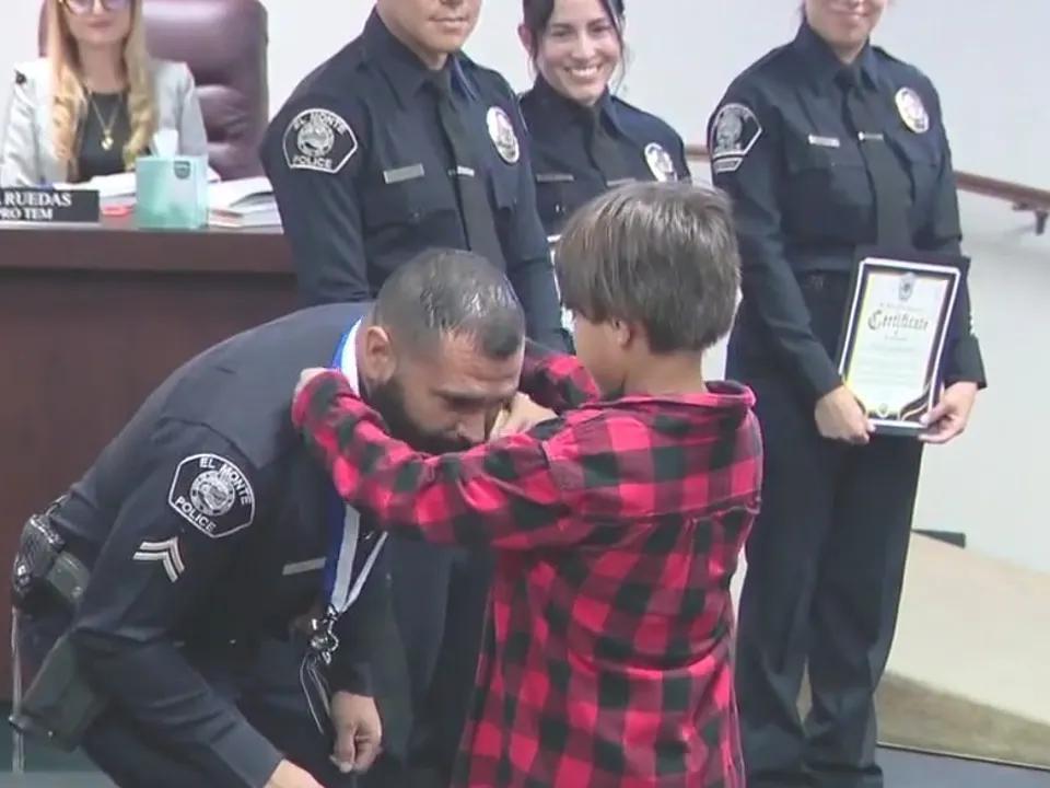 8-year-old reunited with cops who saved him