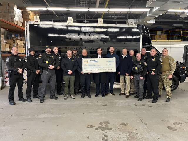 County SWAT Team receives funds - NewsBreak