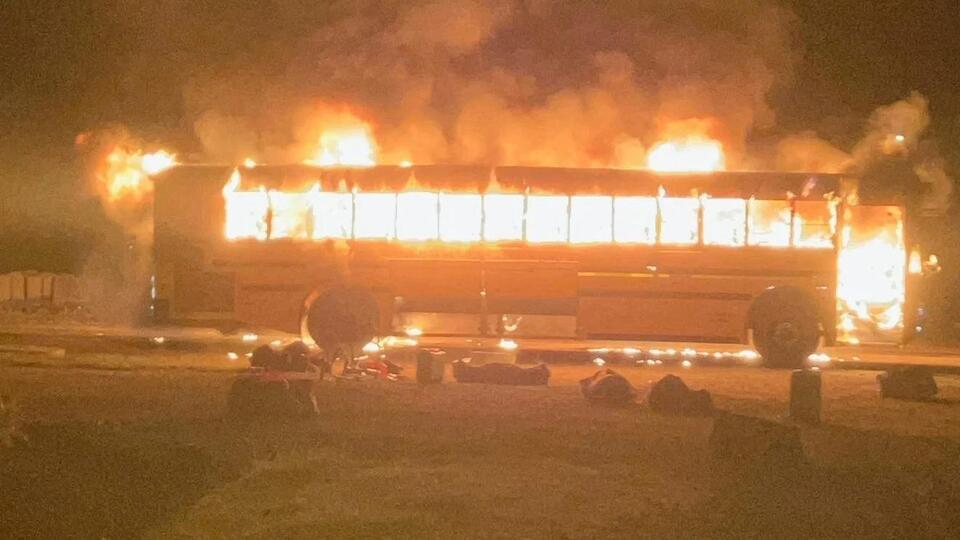 PHOTOS: School bus erupts into flames while transporting football team ...