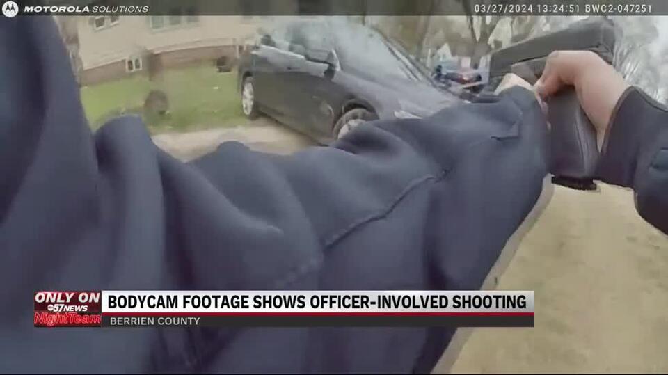 New video shows the day that left one officer injured and a suspect ...