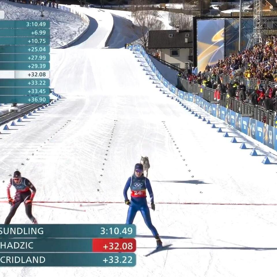 Loose dog crosses the finish line at Olympic skiing event - NewsBreak