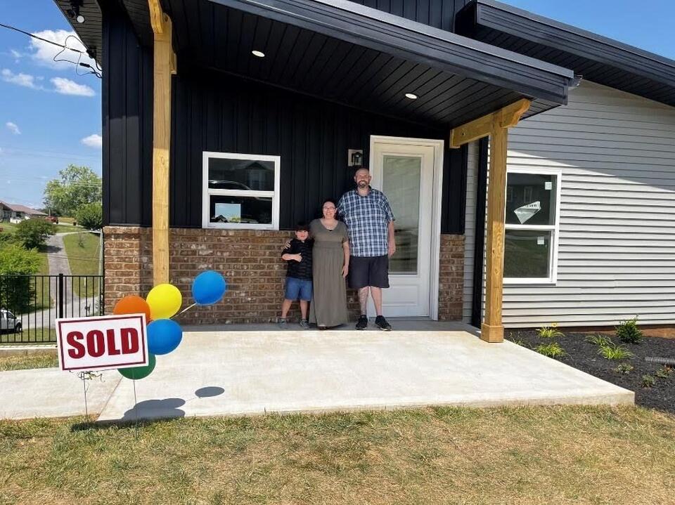 Habitat hosts dedication for new home - NewsBreak