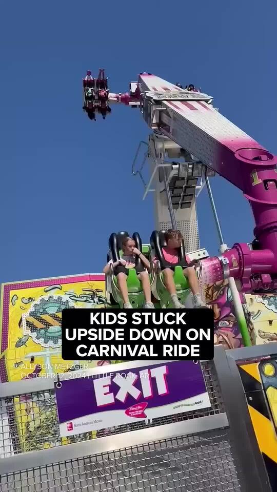 Mom frustrated as young children stuck upside-down on carnival ride ...