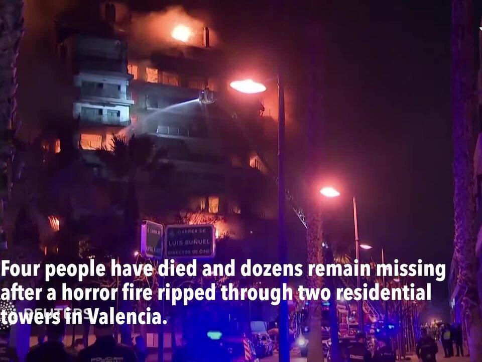 Valencia fire tears through tower block as firefighters rescue ...