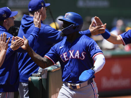 Texas Rangers score 10 runs in second inning, beat Oakland Athletics 15-8