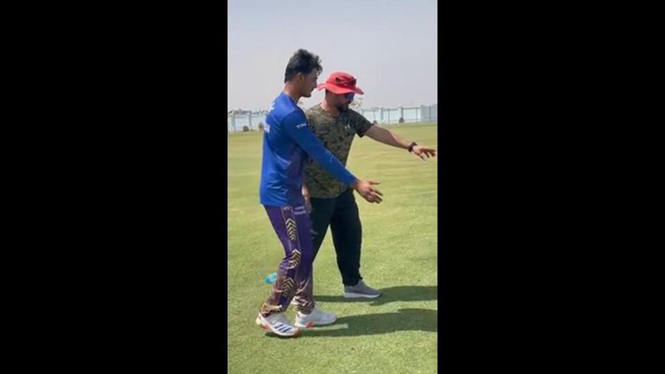 Raees Ahmadzai coaches Allah Ghazanfar during ACC Men's T20 Emerging ...