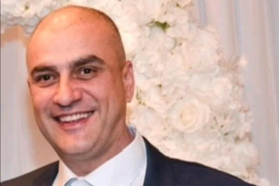 Employee arrested after CEO found dead inside burning building near ...