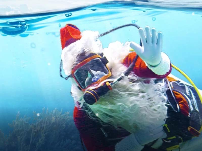 Scuba Santa dives into Adventure Aquarium’s Christmas Underwater ...