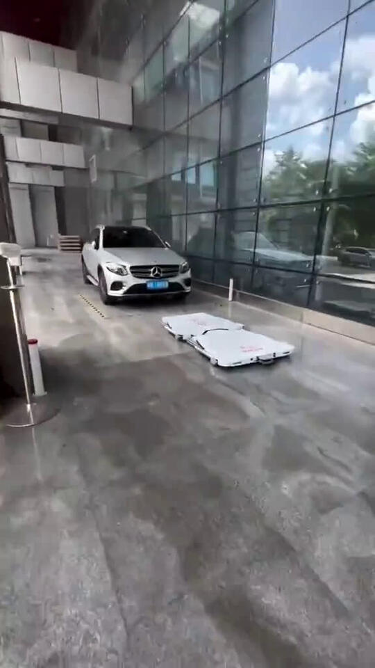 autonomous valet robot capable of lifting and moving cars without human ...