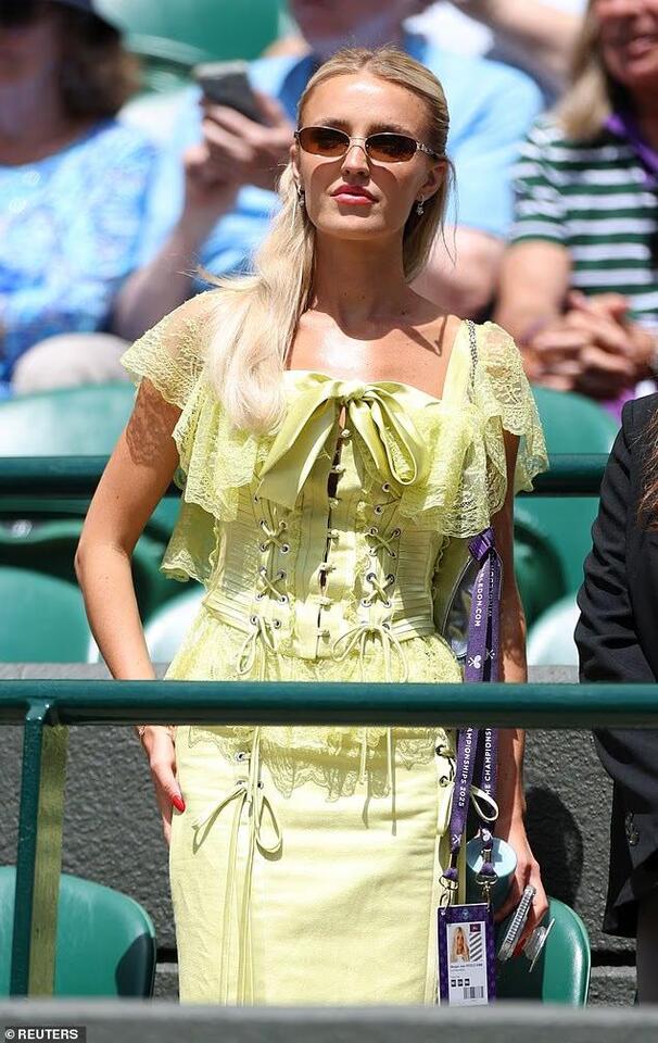 Glamorous tennis WAG Morgan Riddle dons period-style dress to watch ...