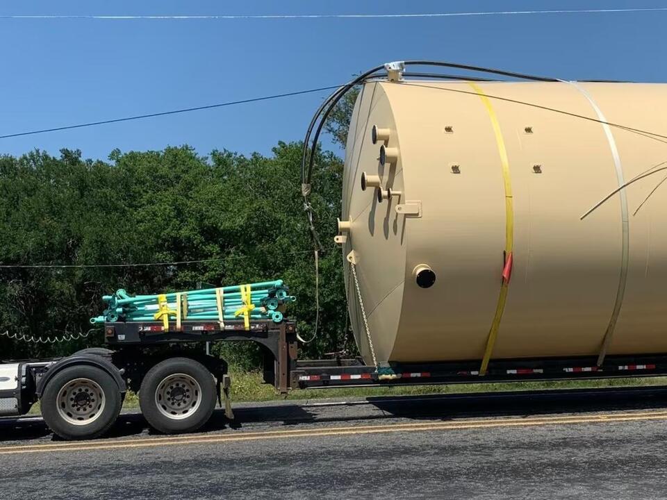 Truck carrying large load ‘falls across roadway’ after striking fiber ...