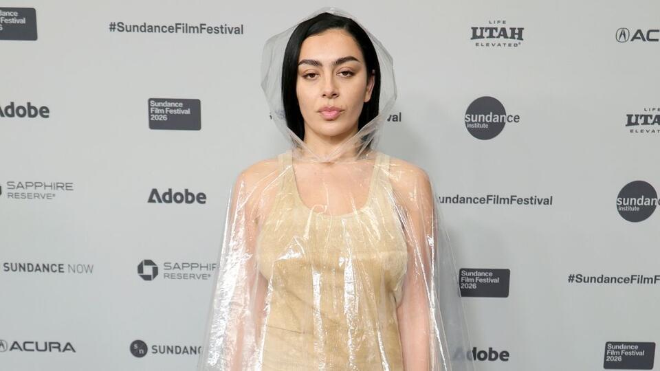 Charli XCX’s Latest Bikini Look Gets a Fun Addition - NewsBreak