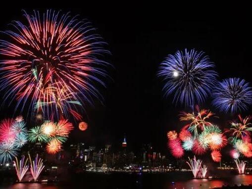 What makes fireworks burst with vibrant colors?