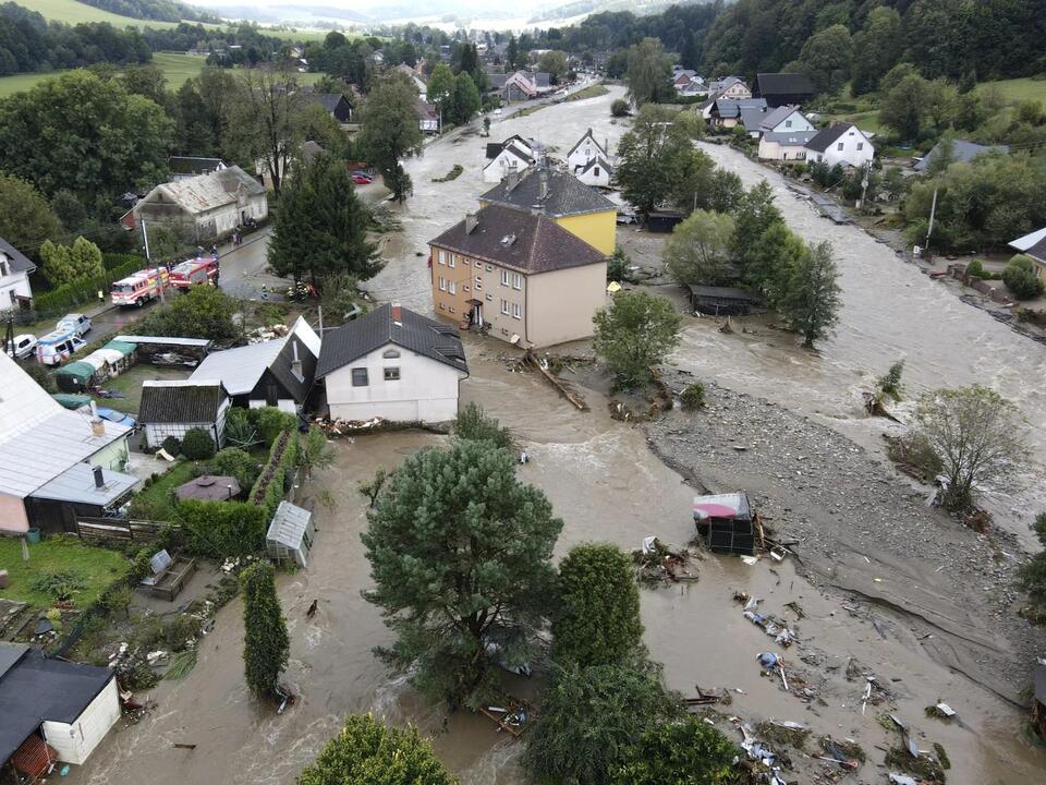 Death toll rises as torrential rain and flooding force evacuations in ...