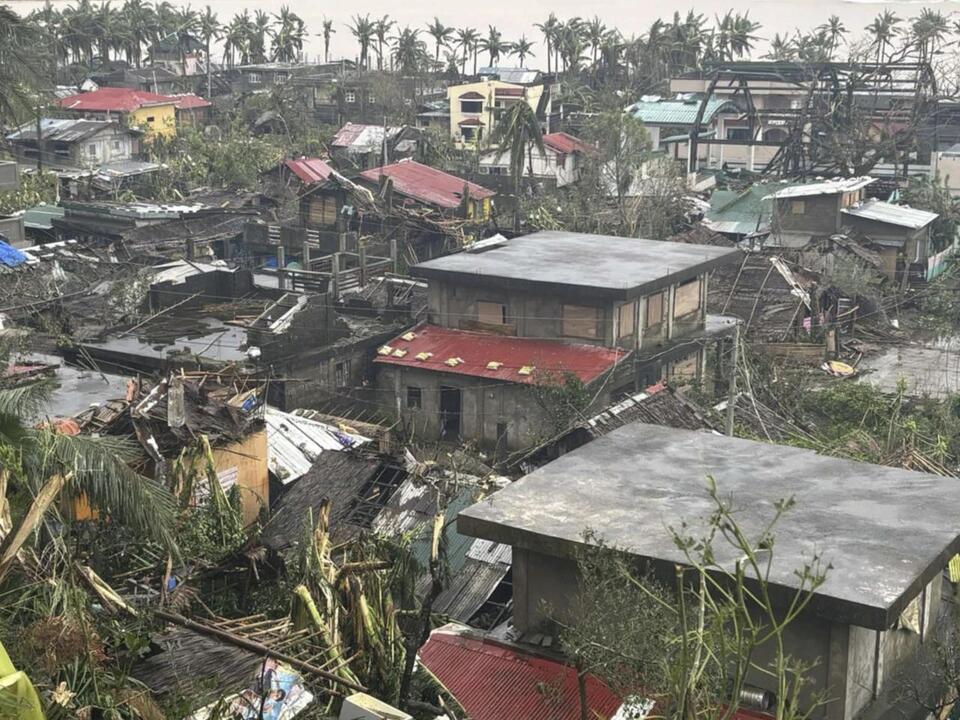 Latest typhoon lashes the Philippines, causing tidal surges and ...