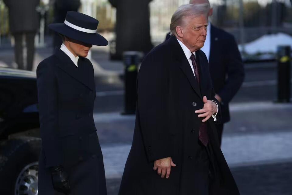 Melania Trump's funeral-like outfit mocked as she keeps head down at ...