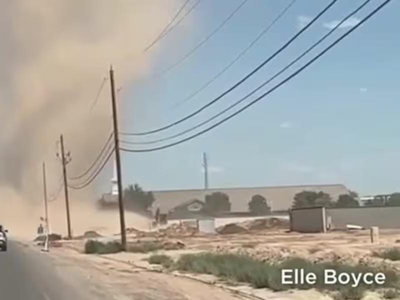 Whoa! Large dust devil forms near road in Queen Creek