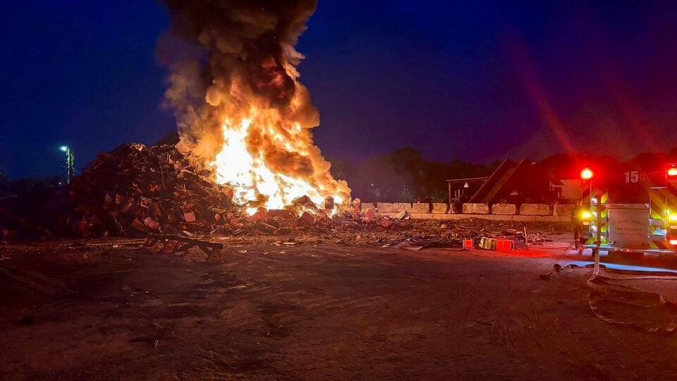Dramatic explosions as Fort Pierce scrap pile erupts in flames - NewsBreak