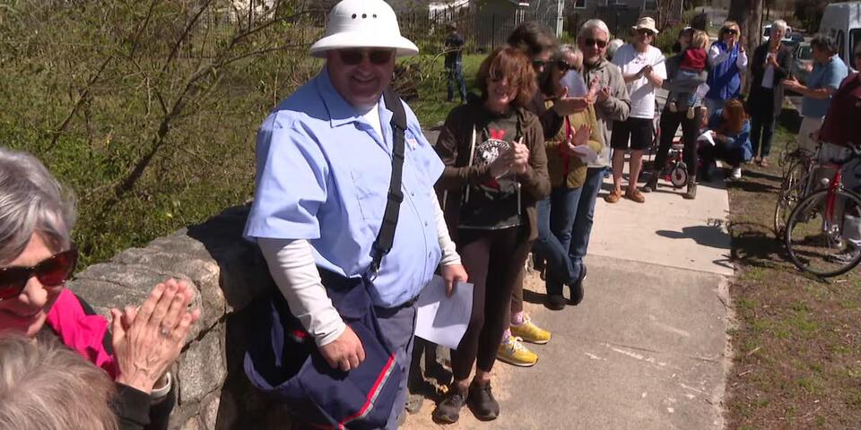 Forest Hills neighborhood sends off favorite singing postmaster