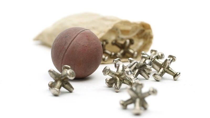 The game of Jacks, or one of its historic names, Knucklebones, was ...