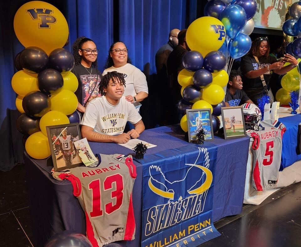 Aubrey celebrates largest-ever football signing class on National ...