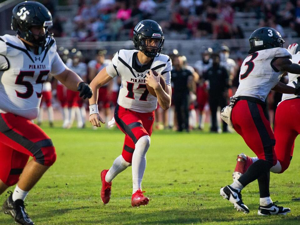 PREP FOOTBALL: Pirates run away from Red Knights