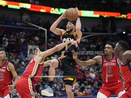 Devin Booker scores 52 points to lift the Suns over the Pelicans 124-111