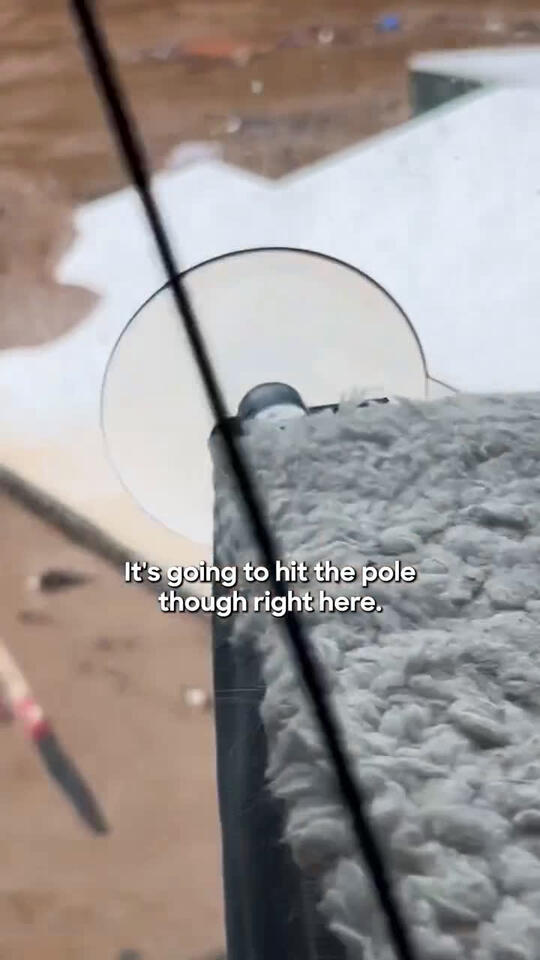 A Rooftop Floats Down a Raging flood until a pole rips it clean - NewsBreak
