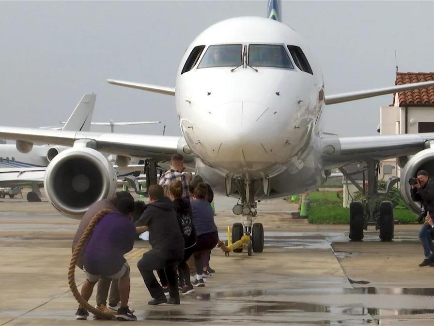 Plane Pull helps Alpha Resource Center