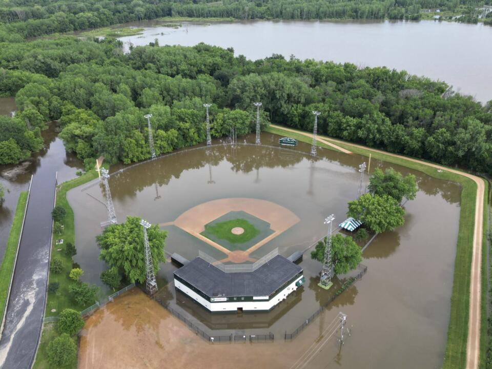 Chaska's Athletic Park intentionally flooded to protect local property ...