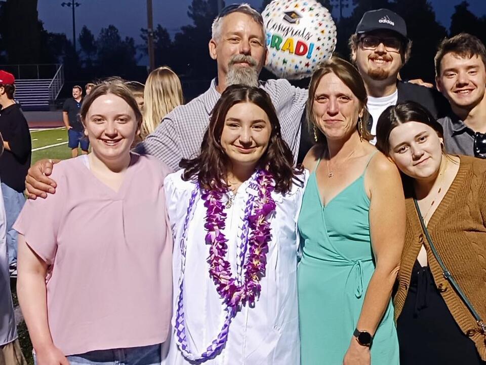 A local couple is graduating college after raising 5 kids together