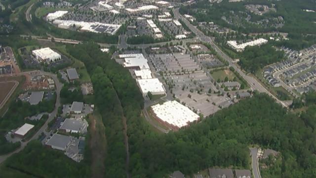 Police officers respond to O2 Fitness in Morrisville - NewsBreak