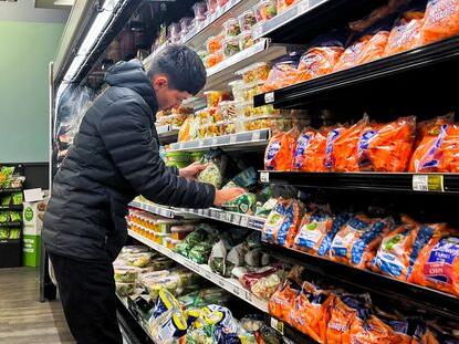 Inflation rises moderately in April, consumer spending slows