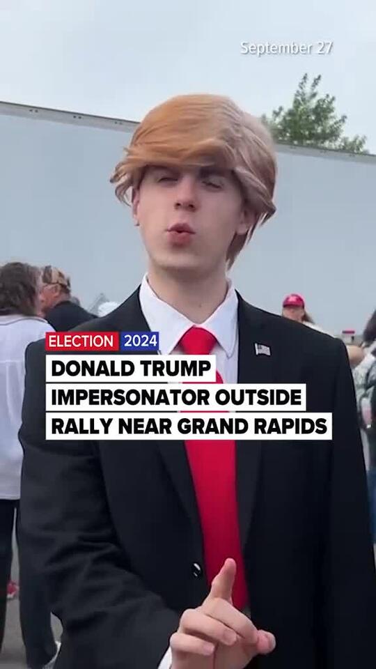 Ian Webb from Cedar Springs shows off his best Trump impression outside ...