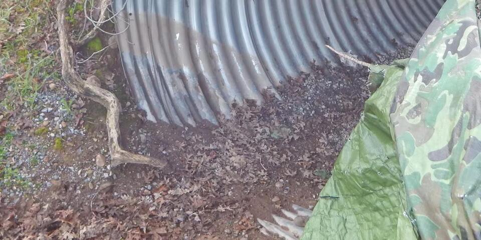 Raid uncovers illegal pot operation, underground bunker, firearms, ammo ...