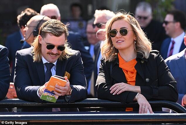 Ariane Titmus is spotted looking smitten at the races with Ryan ...