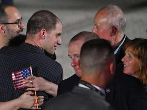 Tears, hugs and a salute as 3 freed Americans return home after ...