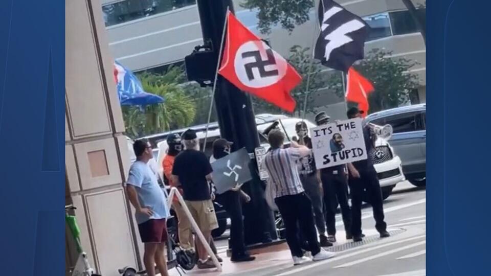 Nazi flags and other racist imagery displayed outside Tampa Convention ...