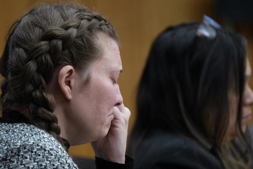 Woman accused of killing 6-year-old stepson in Delta Township sobs as ...