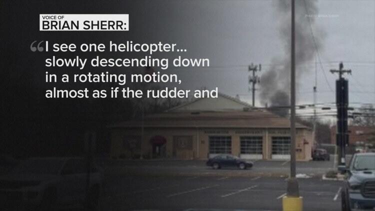 Officials investigate a mid-air helicopter collision, which killed a ...